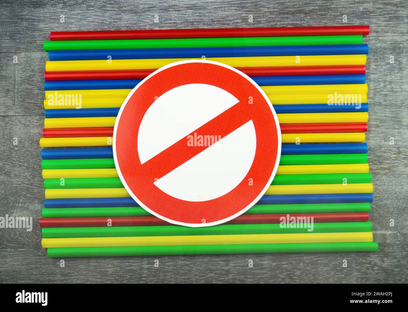 colorful plastic straws with probibition sign Stock Photo - Alamy