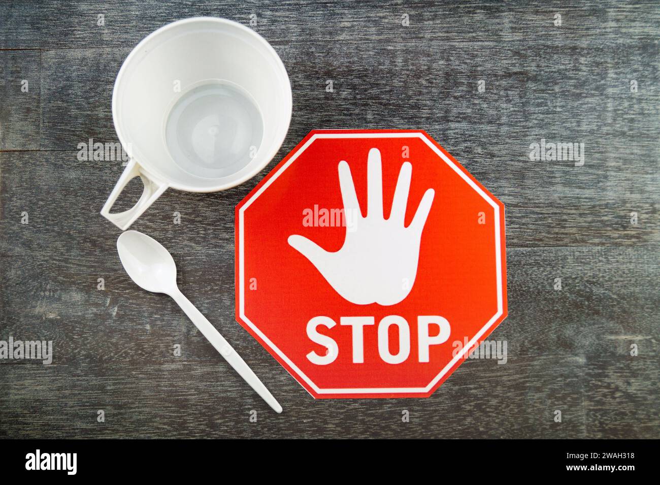 single-use tableware, plastic cutlery and stop sign, symbolic picture ...