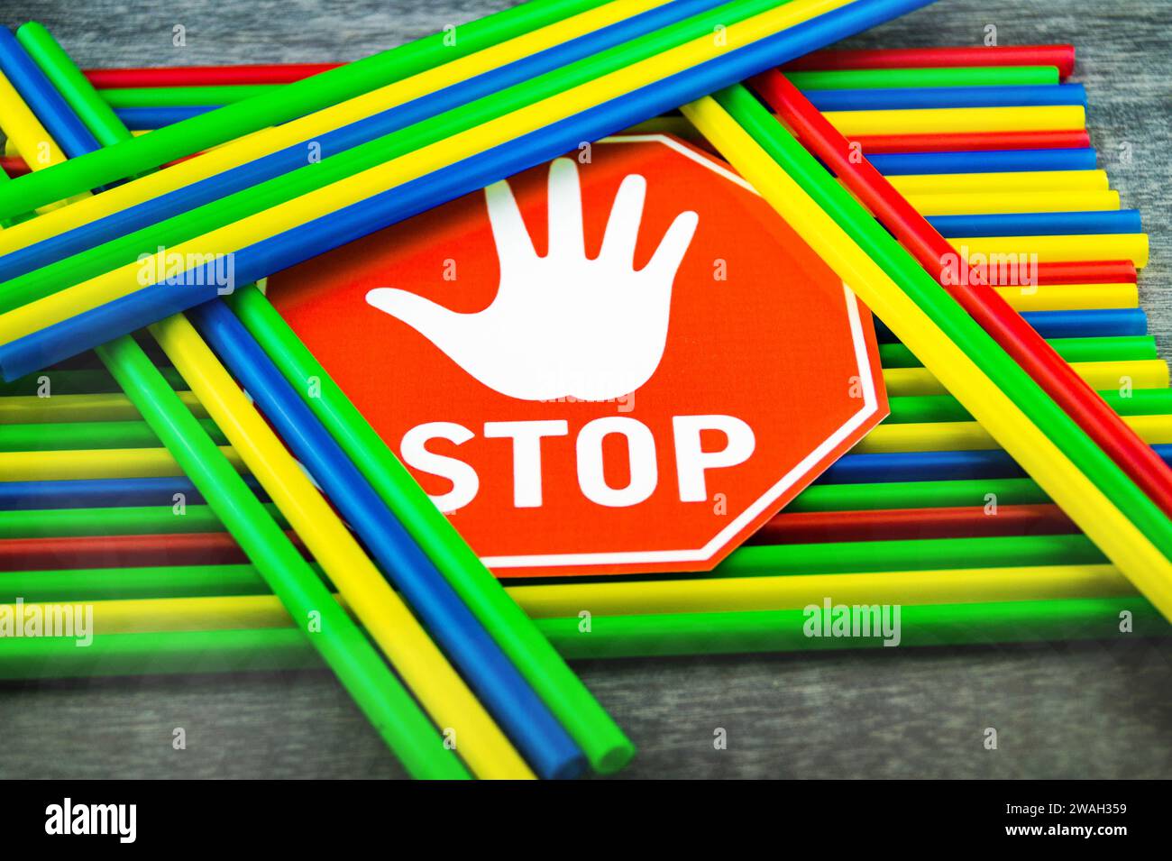 colorful plastic straws with stop sign Stock Photo - Alamy