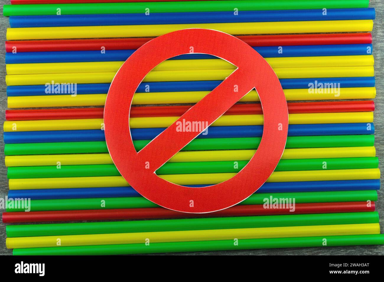 colorful plastic straws with probibition sign Stock Photo - Alamy