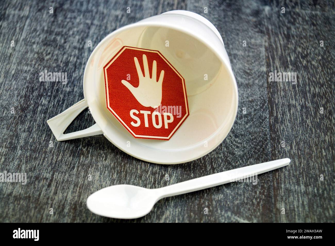 single-use tableware, plastic cutlery and stop sign, symbolic picture ...