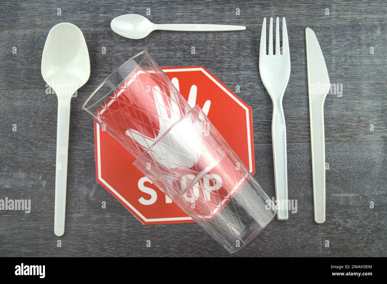 single-use tableware, plastic cutlery and stop sign, symbolic picture ...