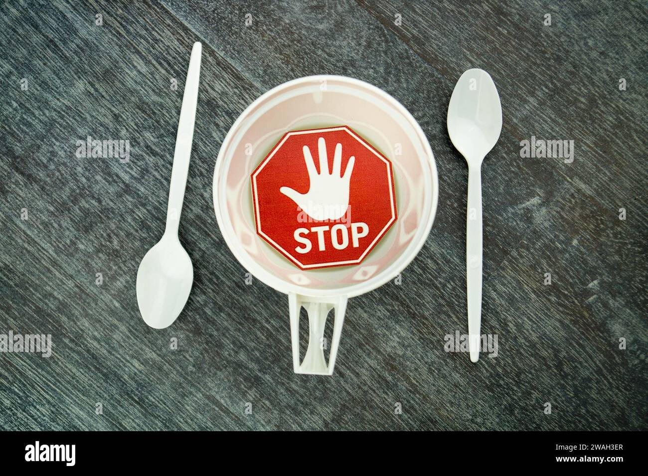 single-use tableware, plastic cutlery and stop sign, symbolic picture ...