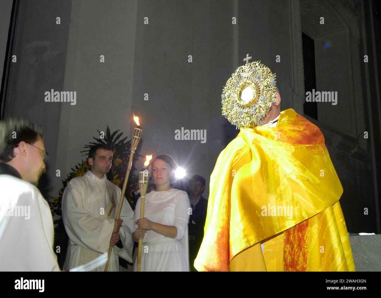 a roman catholic priest, a religious leader in christian religion roman ...