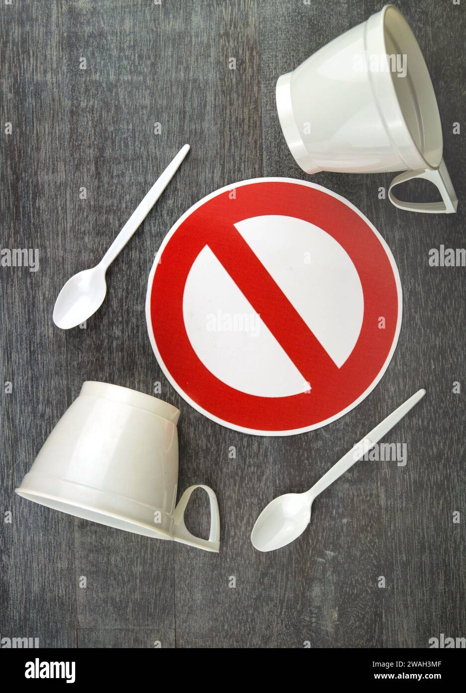 single-use tableware, plastic cutlery and prohibition sign, symbolic ...