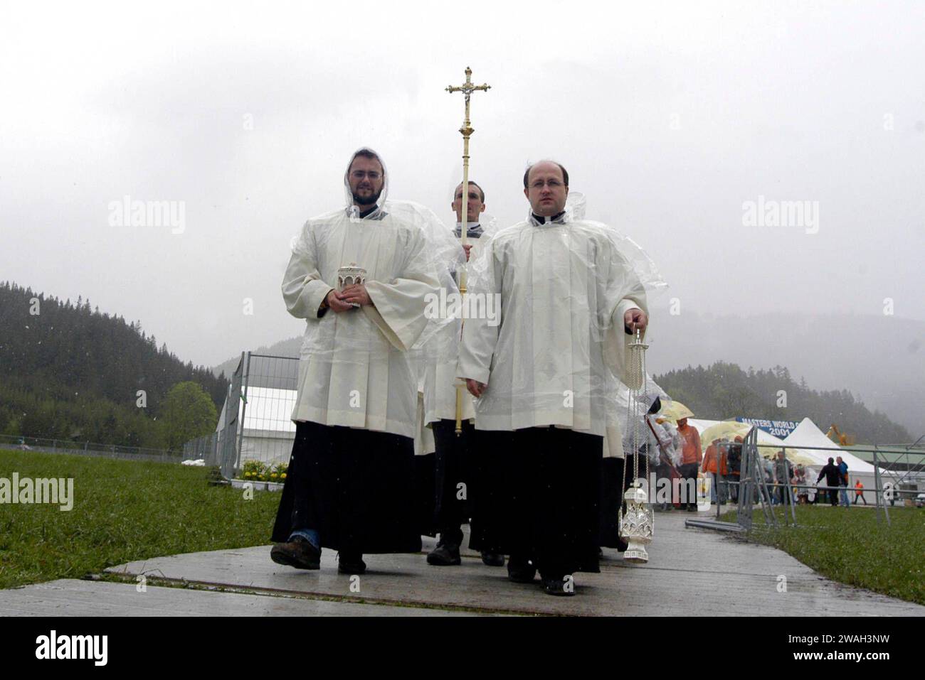 a roman catholic priest, a religious leader in christian religion roman ...