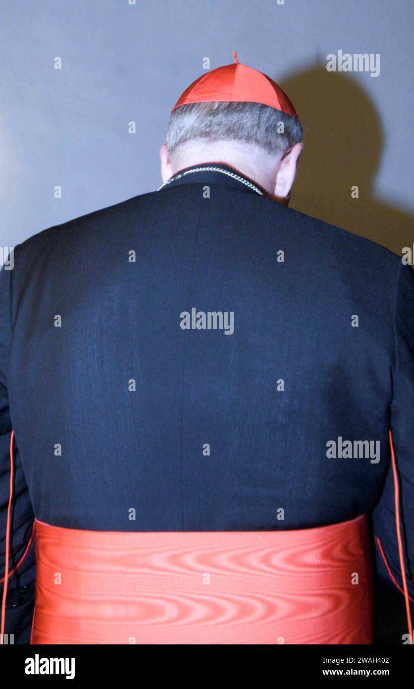 a roman catholic priest, a religious leader in christian religion roman ...