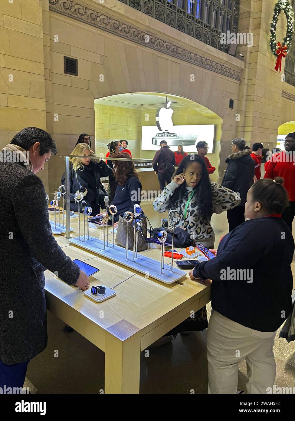 People checking out the newest Apple watches at the Gerand Central ...