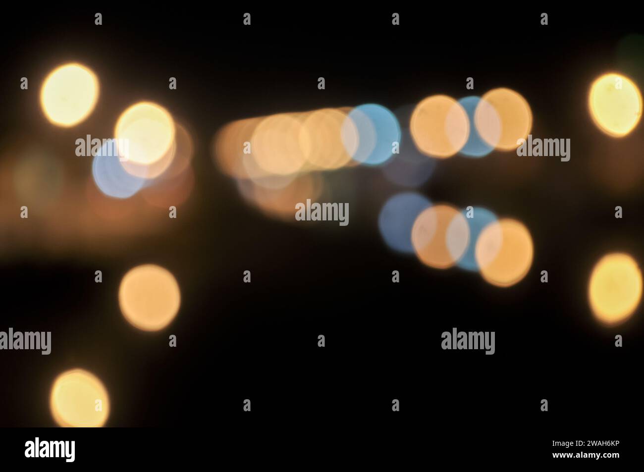 dim lights blur at night as background Stock Photo - Alamy