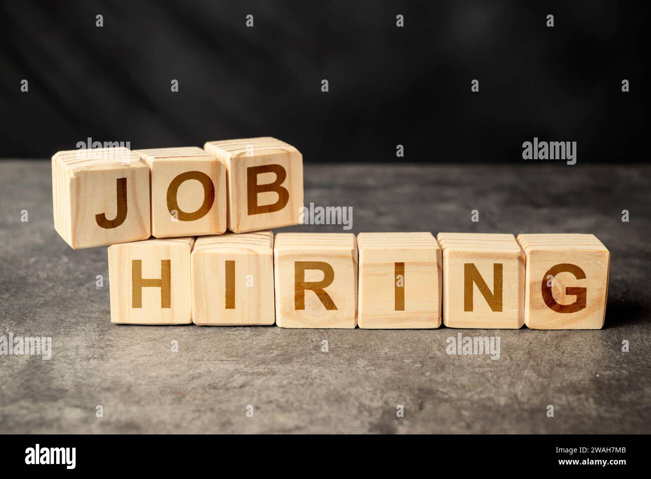 Wooden cubes with JOB HIRING letter. Human resources management concept ...