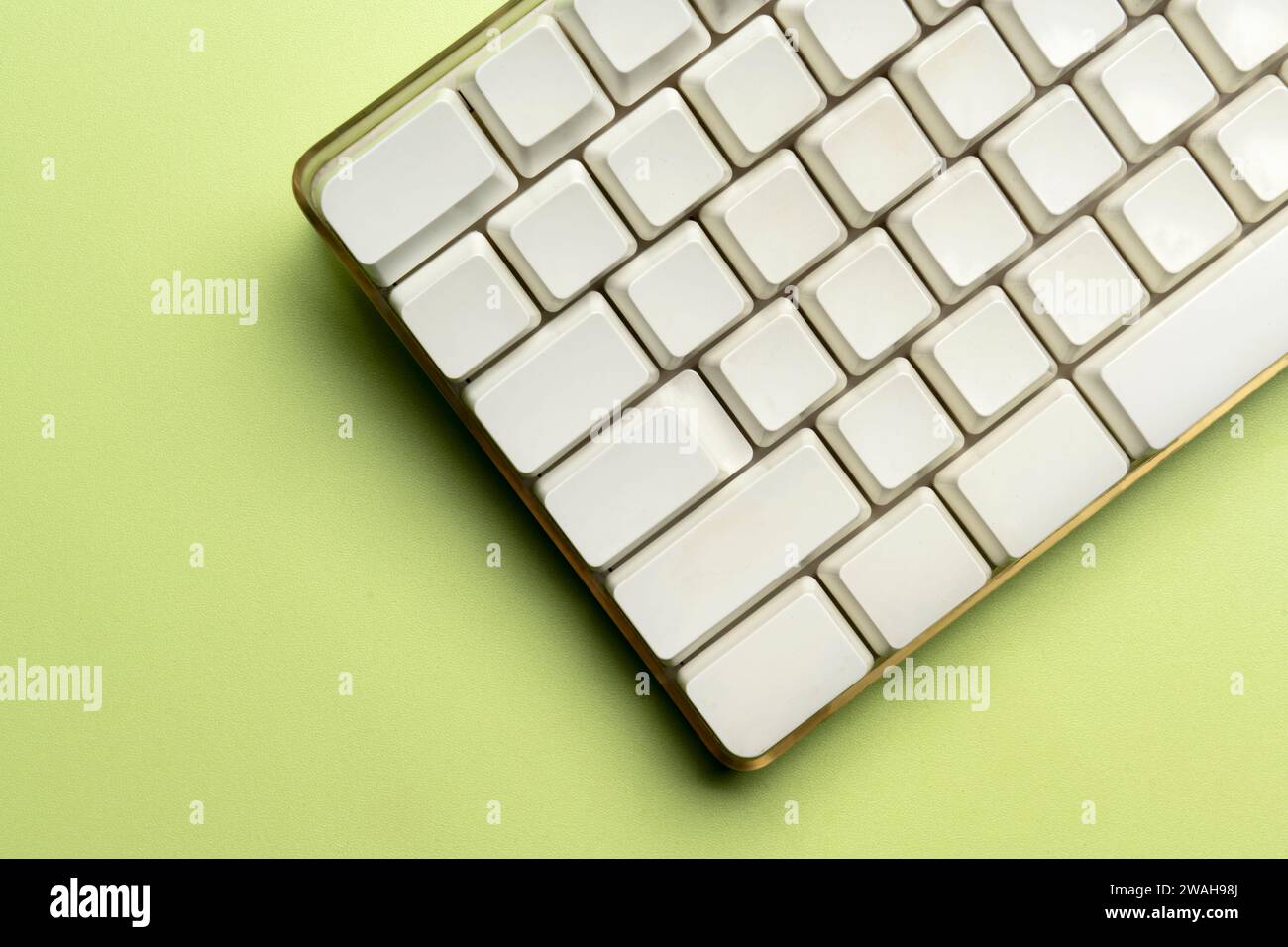 Closeup view of a computer keyboard on a colored background Stock Photo ...