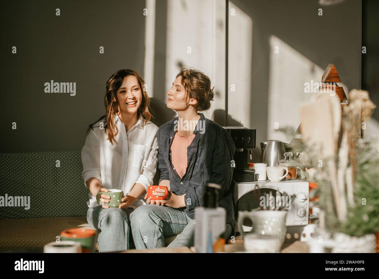 Two girls over coffee hi-res stock photography and images - Alamy