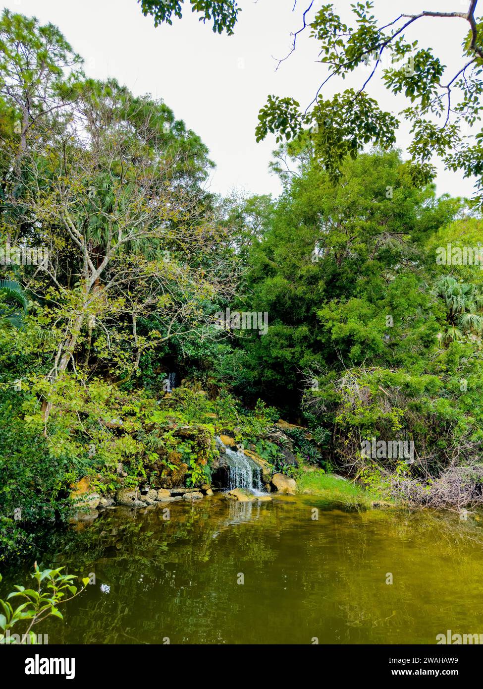Waterfall at a lagoon Stock Photo - Alamy