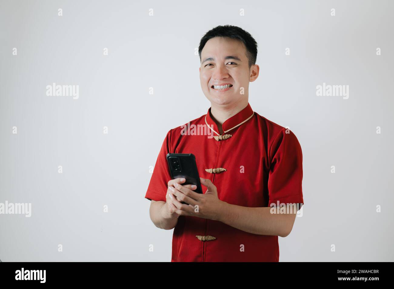 Smile face of Asian man wearing Chinese traditional cloth or Cheongsam ...