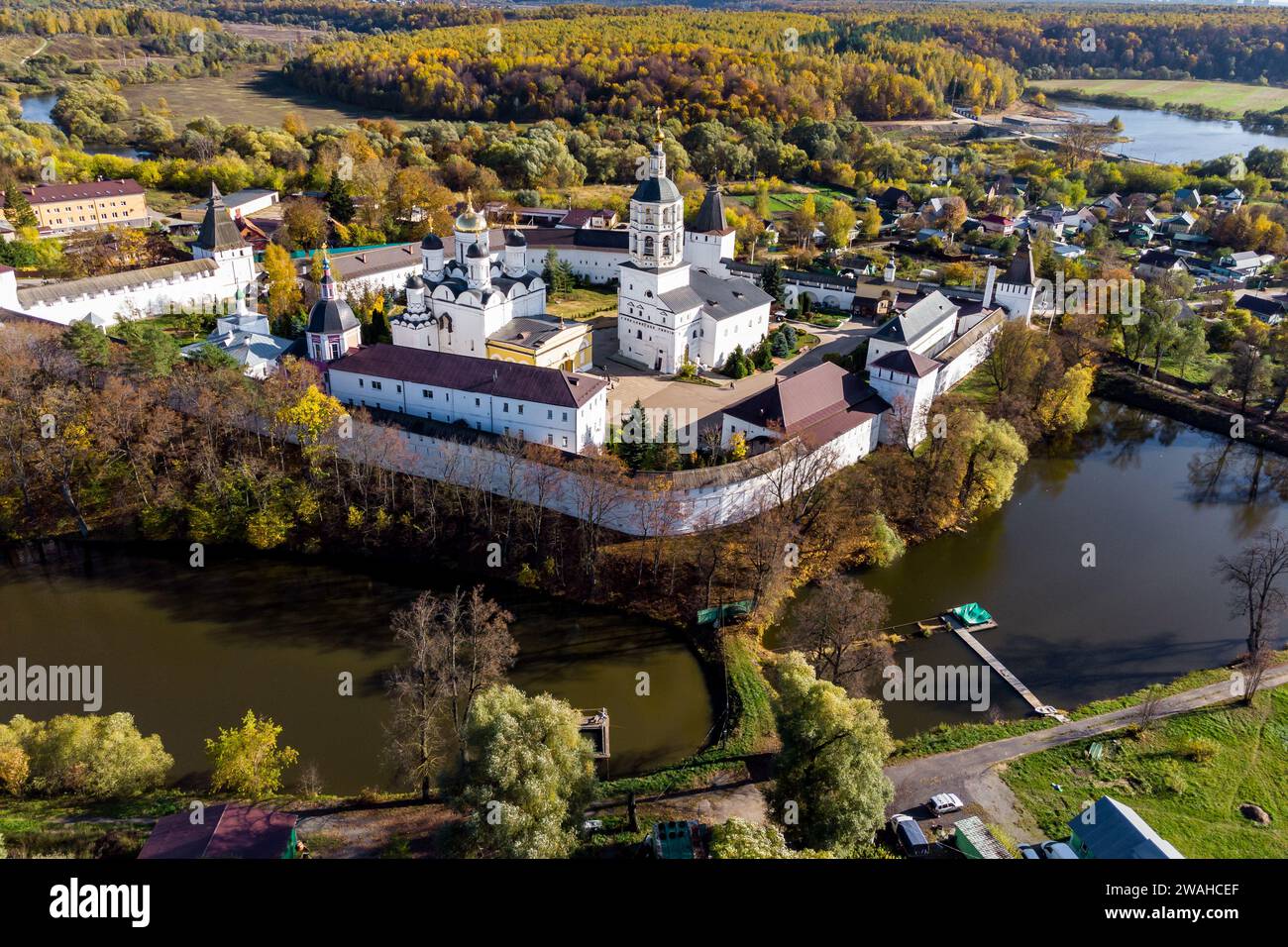 Landscape view of a picturesque medieval Orthodox monastery with white ...