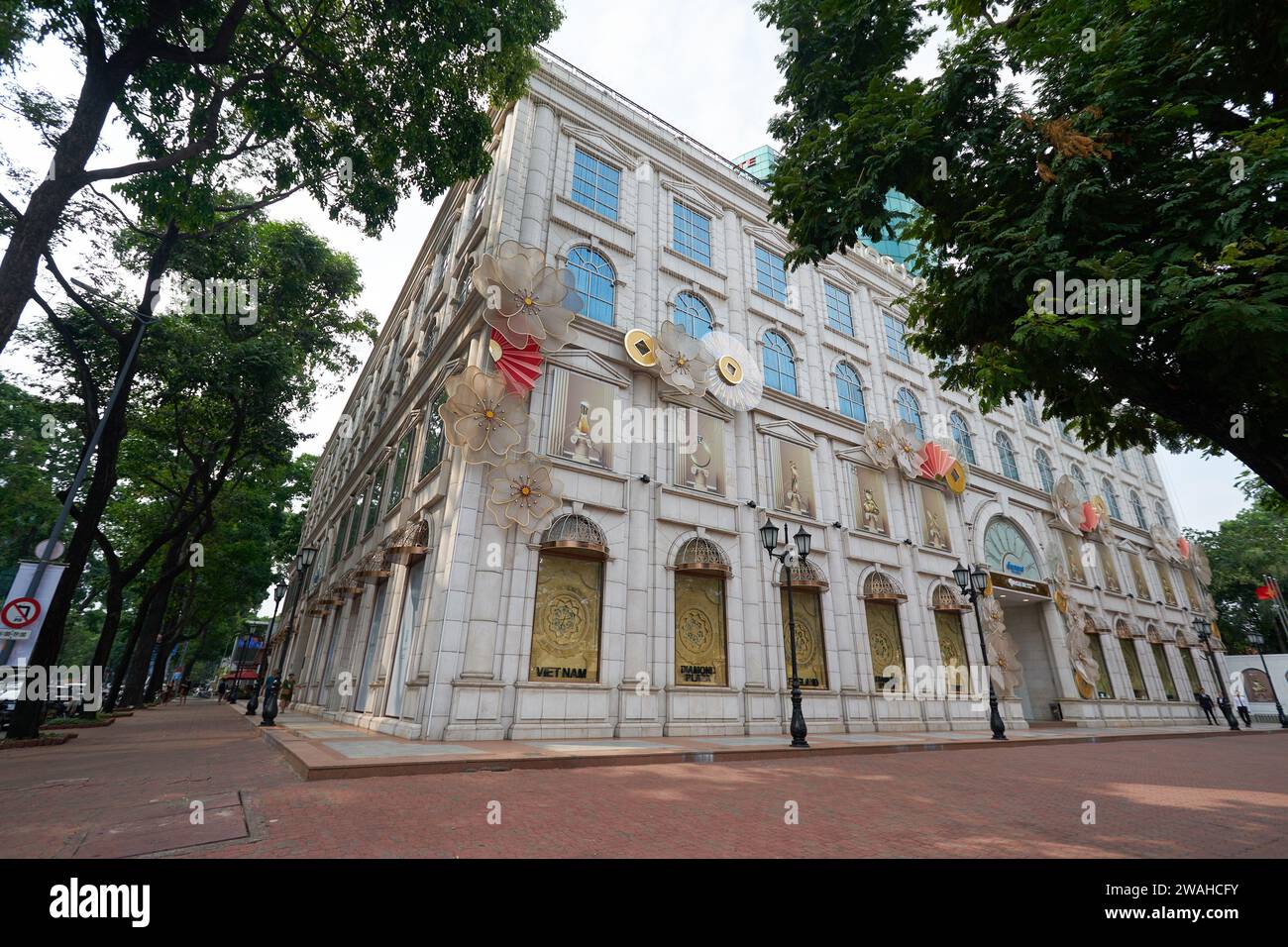 HO CHI MINH CITY, VIETNAM - MARCH 25, 2023: street level view of Diamond Plaza shopping mall in ...