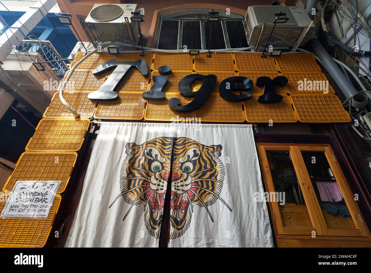 HO CHI MINH CITY, VIETNAM - MARCH 25, 2023: entrance to Sushi Tiger in ...