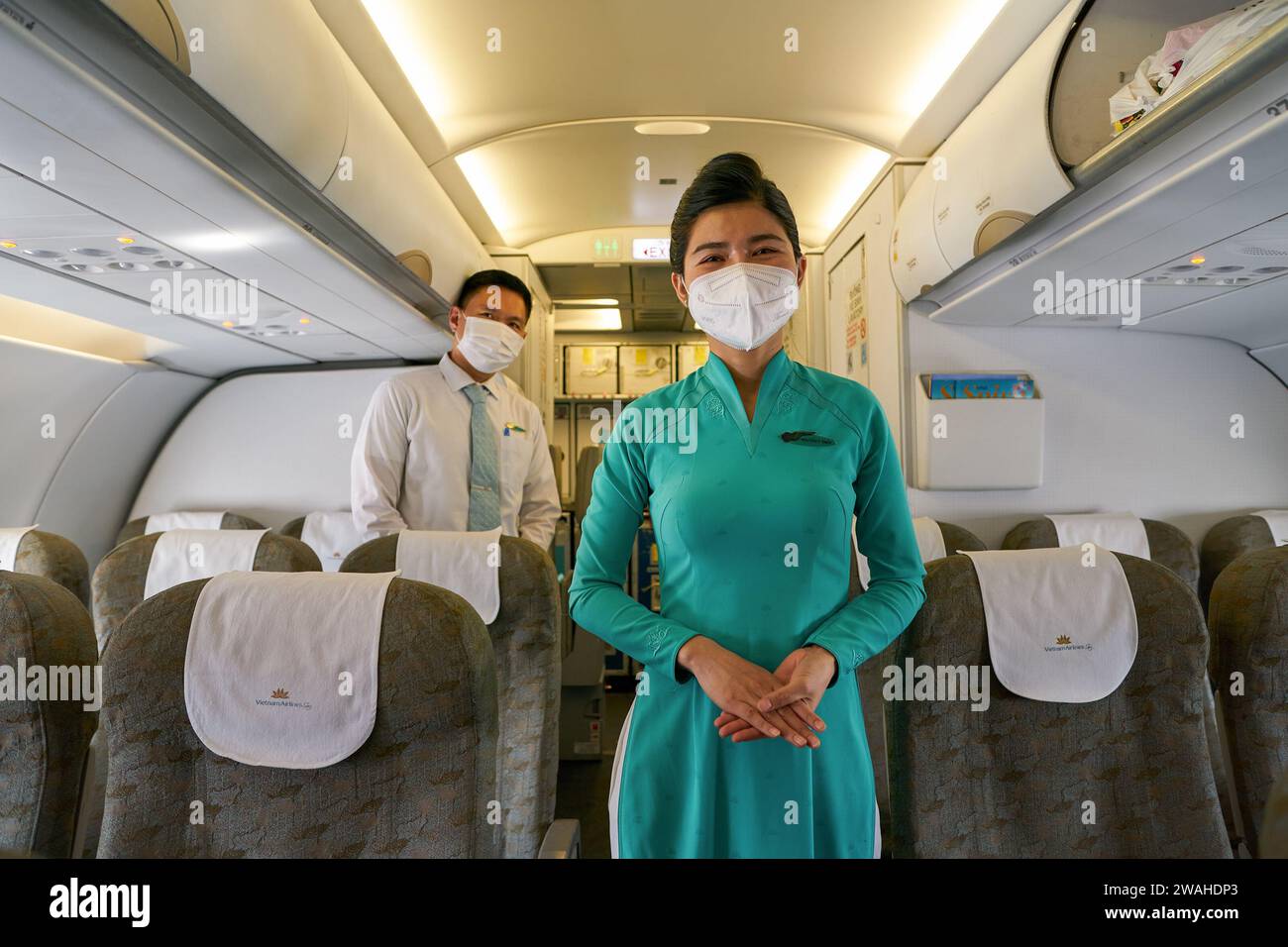 KUALA LUMPUR, MALAYSIA - MARCH 24, 2023: Vietnam Airlines crew members ...