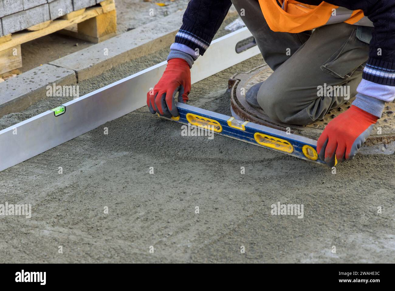 Leveling of sand before laying of decorative stone on sidewalk Stock ...