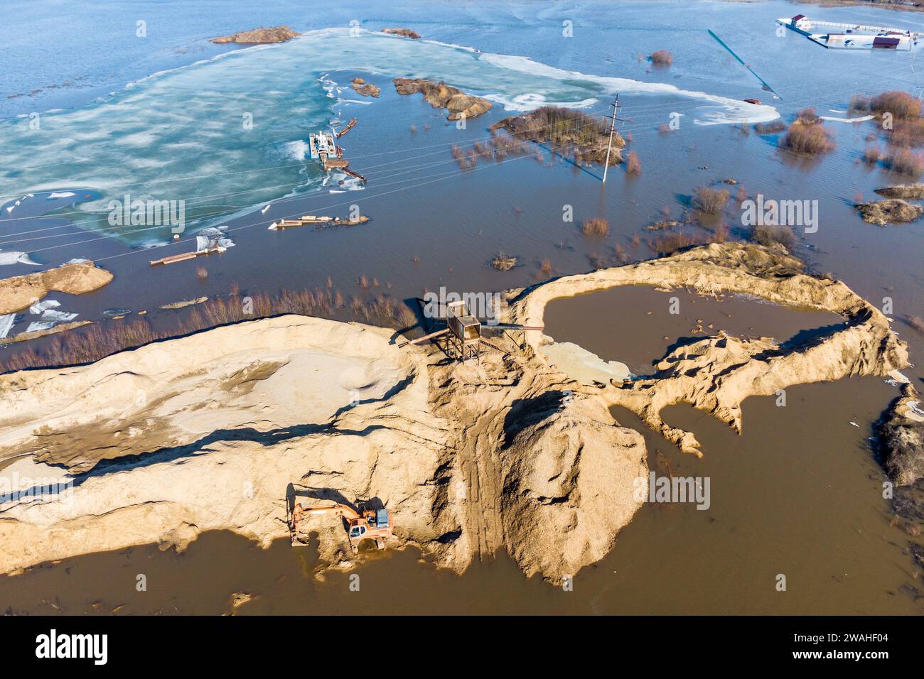 View from a quadcopter of the flooded area of a sand quarry located in ...