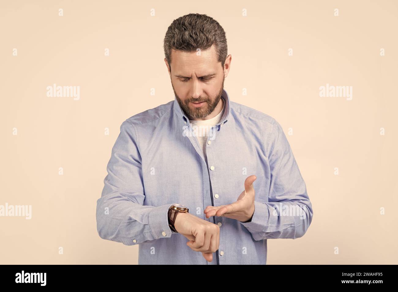 photo of punctual man check time on watch. punctual man with watch ...
