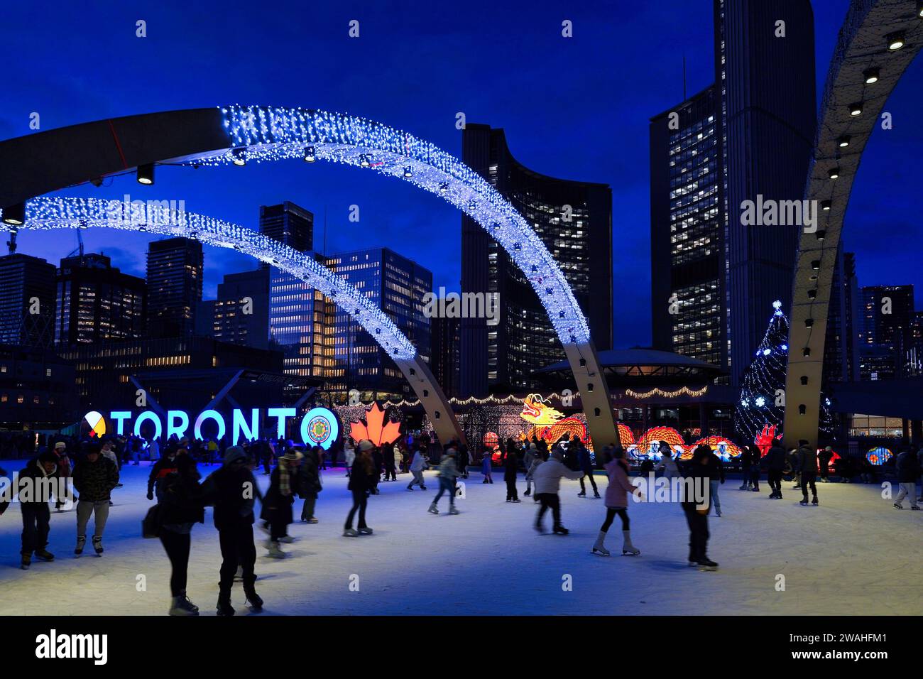 Toronto City Hall skating rink with colorful lights Stock Photo - Alamy