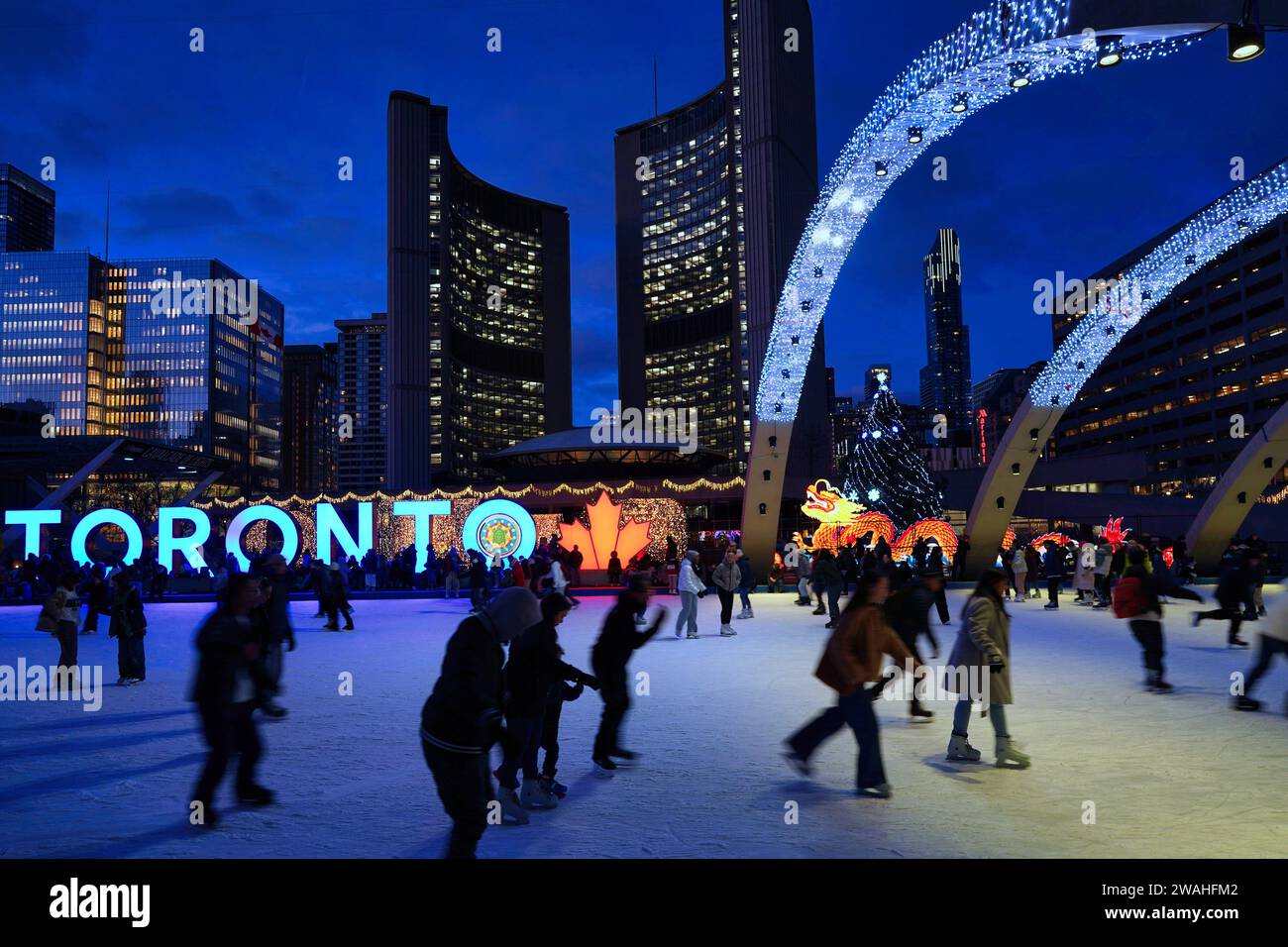 Toronto City Hall skating rink with colorful lights Stock Photo - Alamy