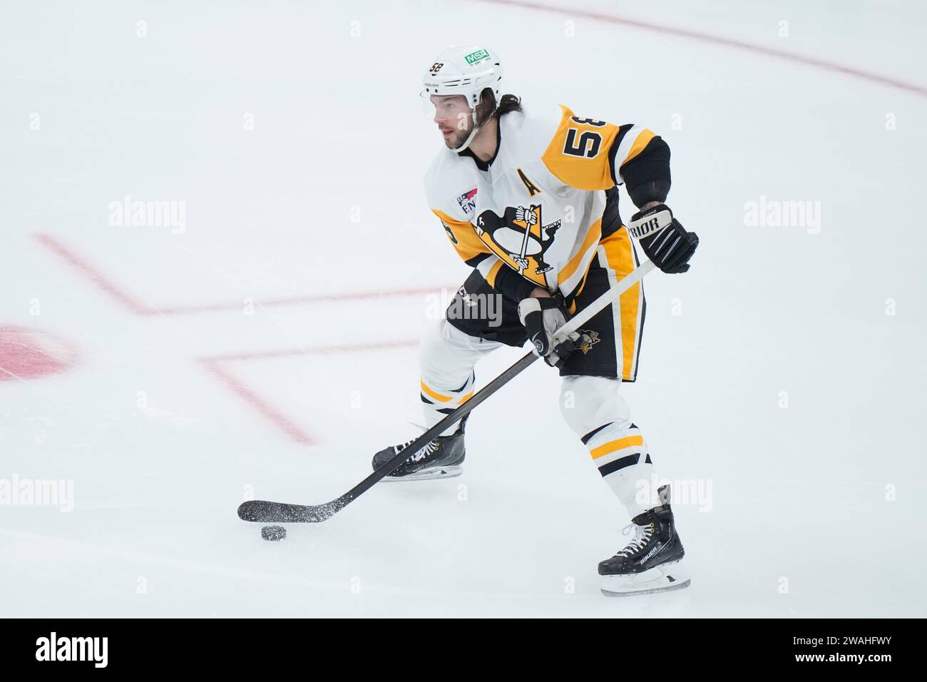 Pittsburgh Penguins defenseman Kris Letang (58) skates in the first ...