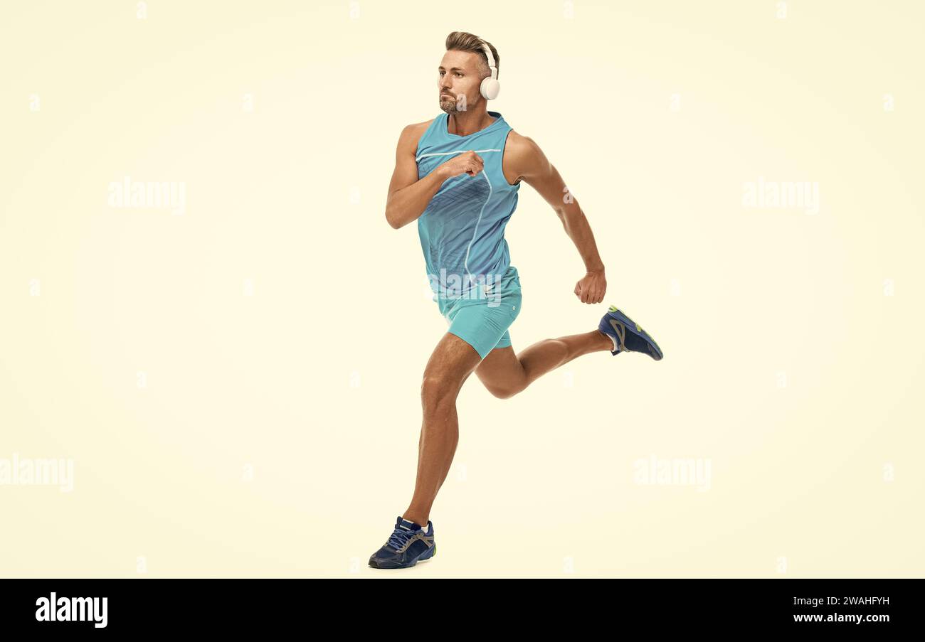 The jogger warmed legs before running. sport jogger listen to music in ...