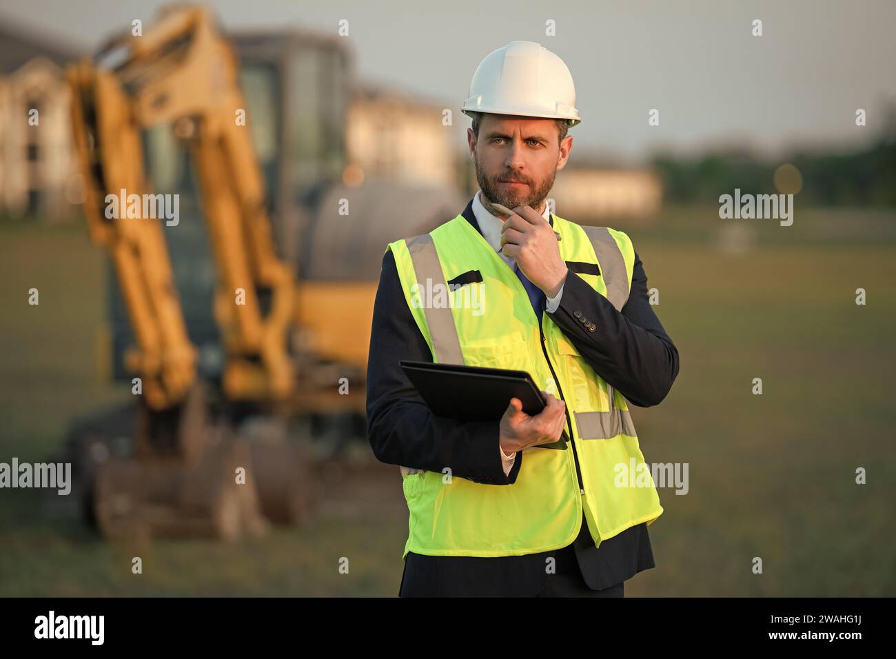 thinking supervisor man at construction site. supervisor man outdoor ...