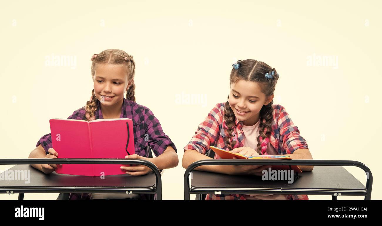 girls children holding book to study homework. back to school. school ...