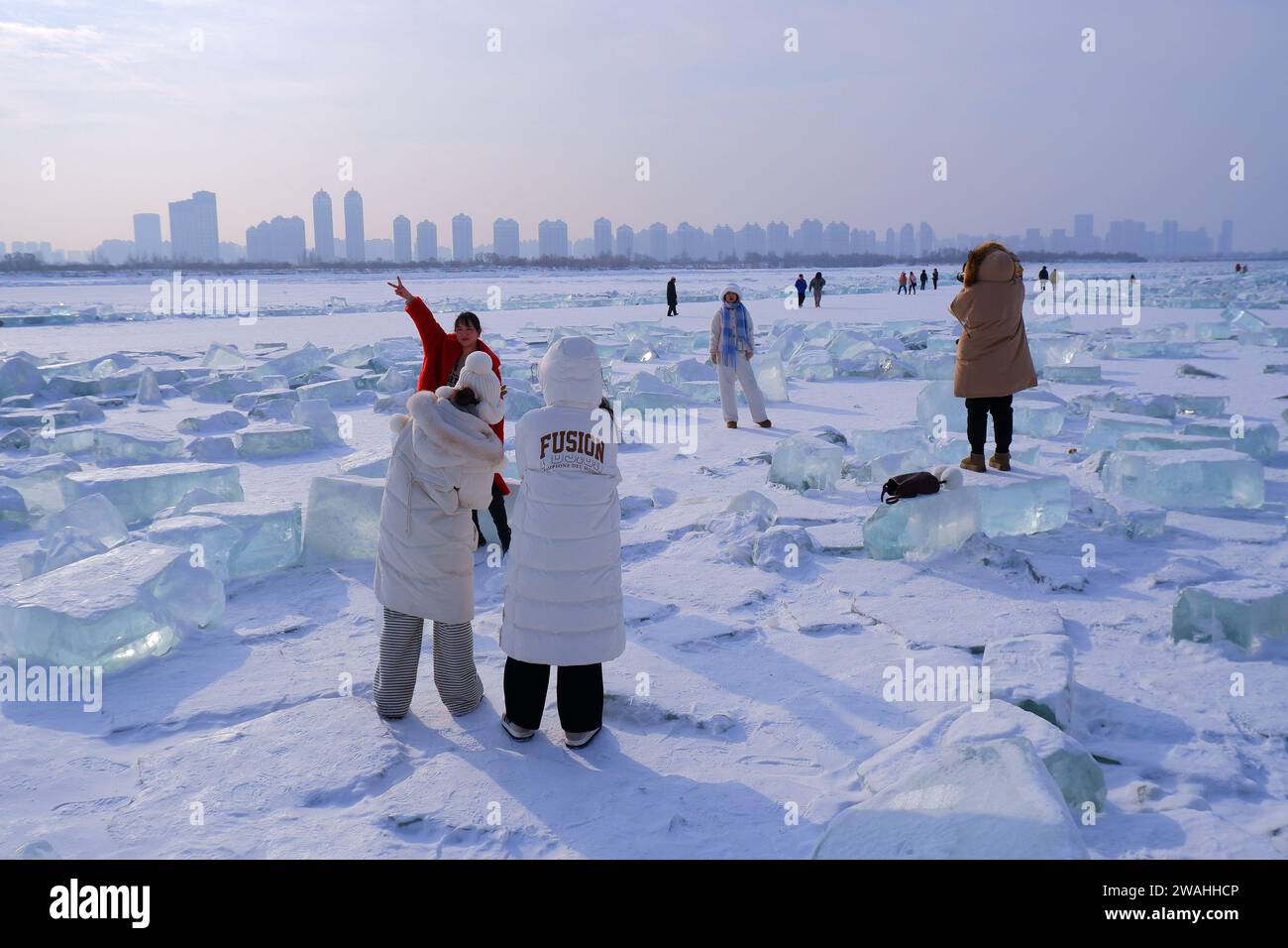 Ice blocks on the frozen Songhua River look like diamonds in Harbin ...