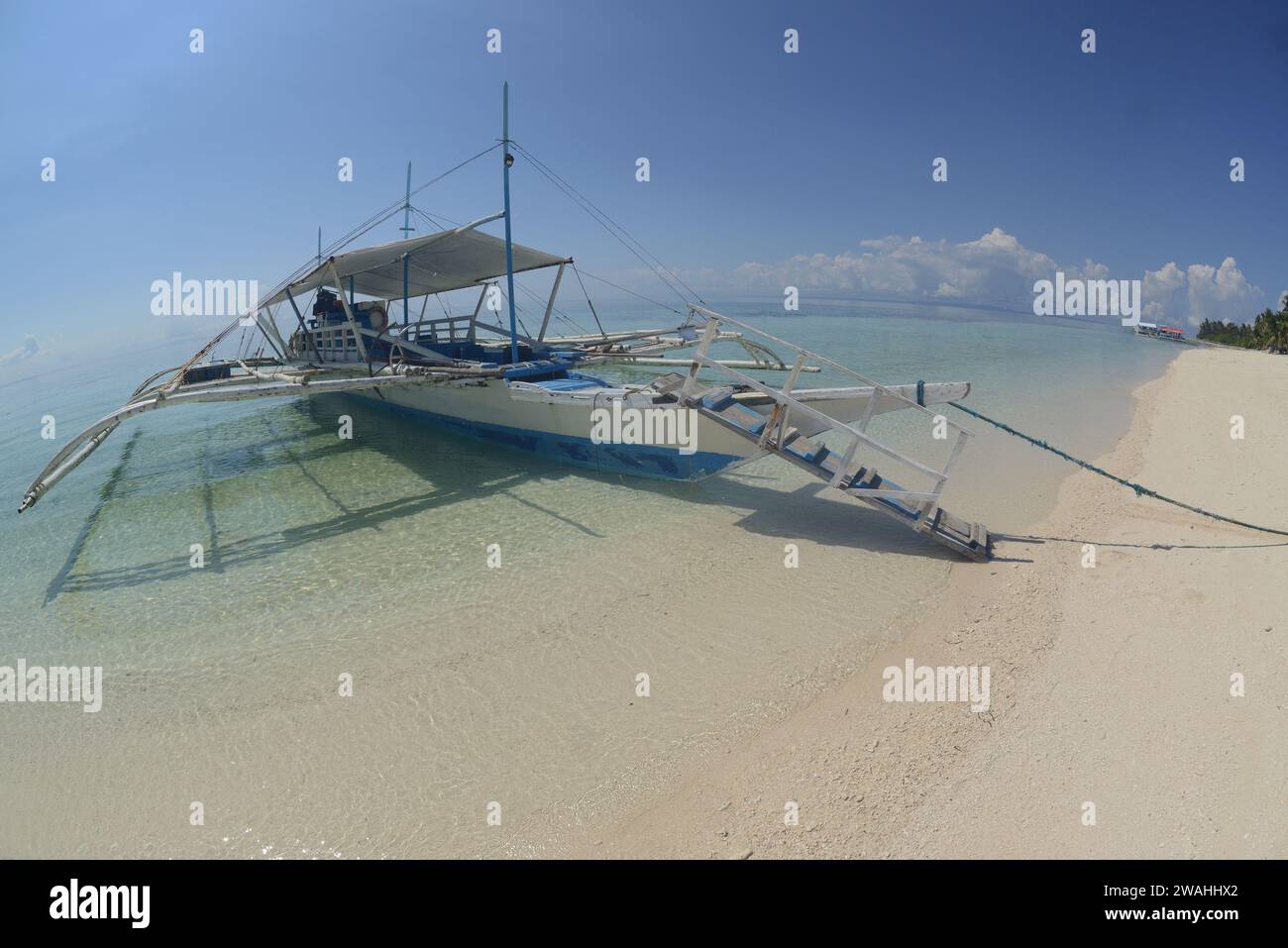 Local traditional Filipino boats or Outrigger boat moored at the ...
