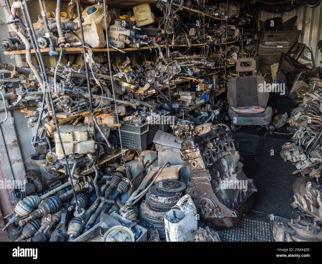 freight container filled with used car parts on junkyard shop Stock ...