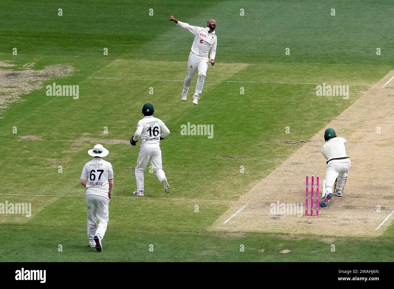 Pakistan's Sajid Khan, top, celebrates after bowling out Australia's ...