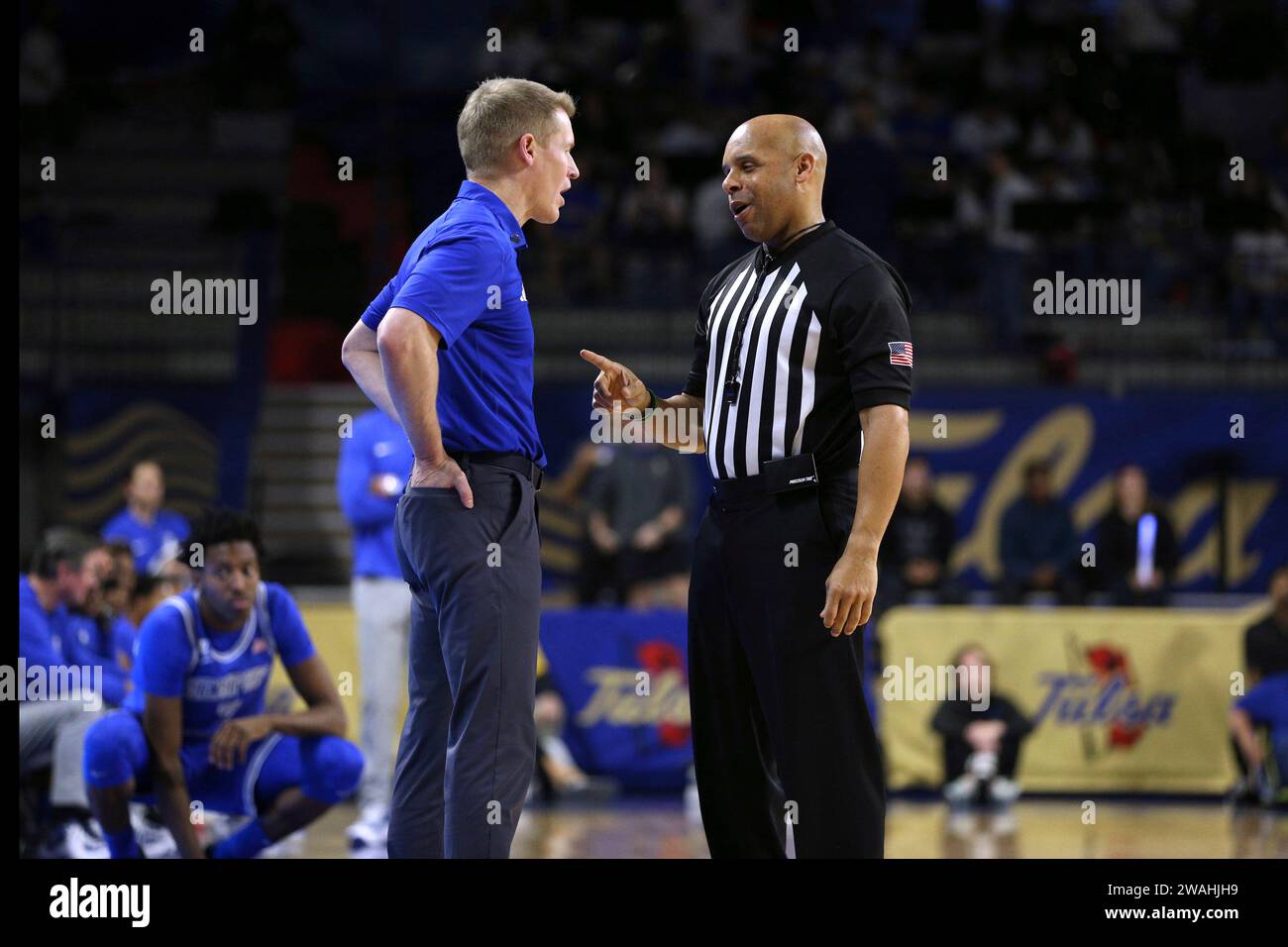Tulsa head coach Eric Konkol talks to an official during the second ...