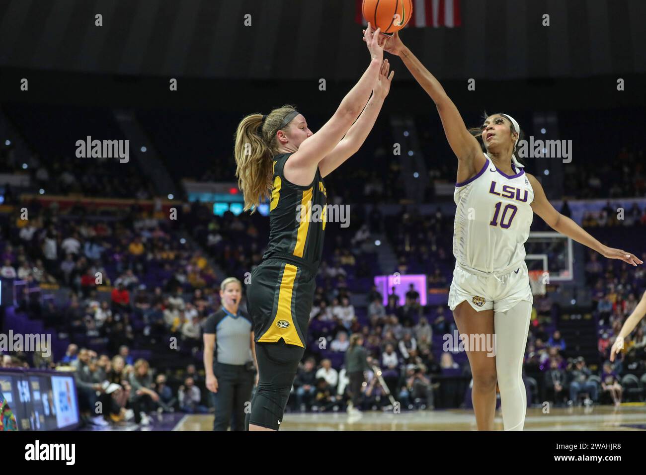 January 04, 2024: LSU's Angel Reese (10) reaches out to try to block ...