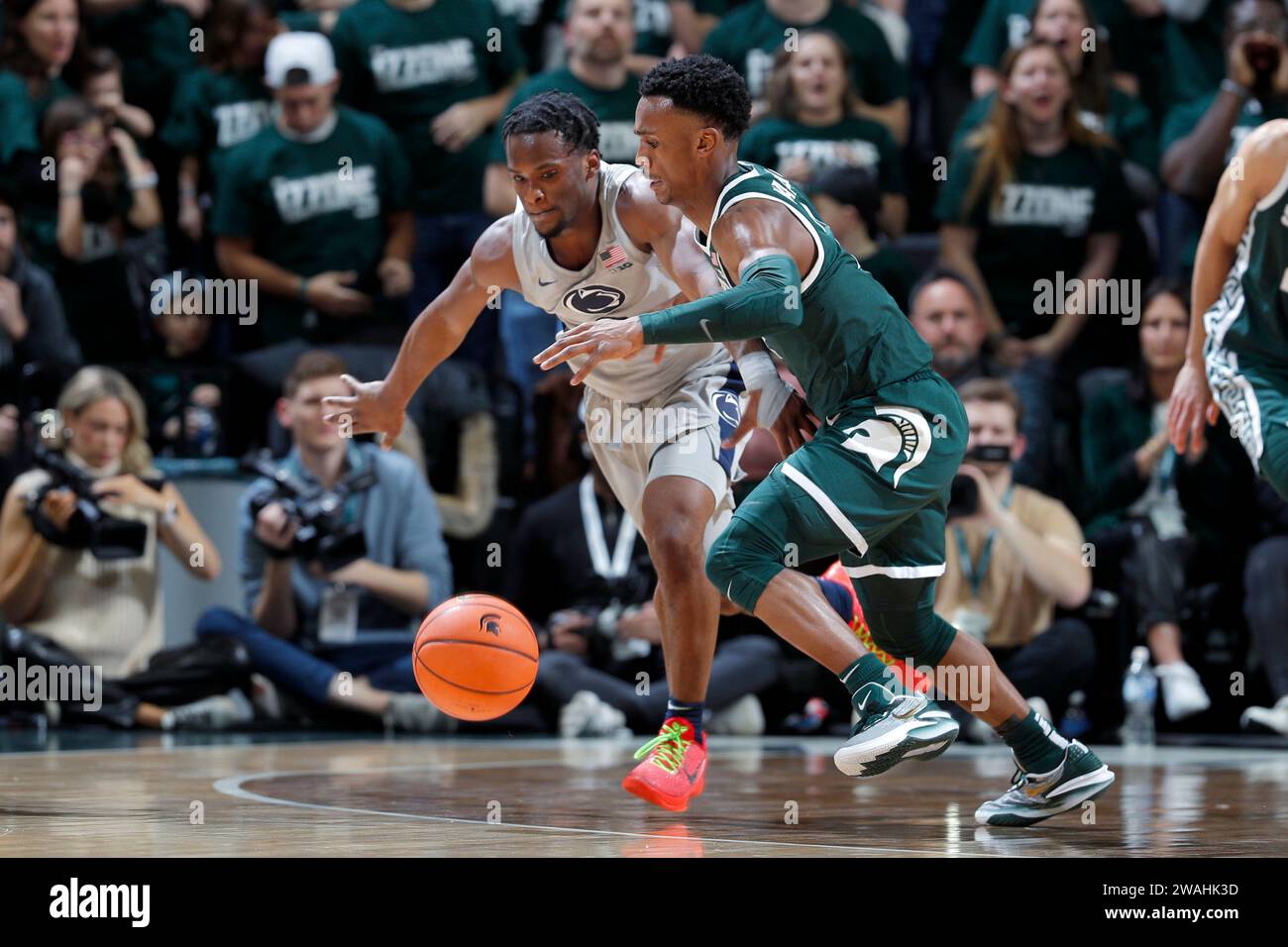 Michigan State guard Tyson Walker, right, and Penn State guard Kanye ...