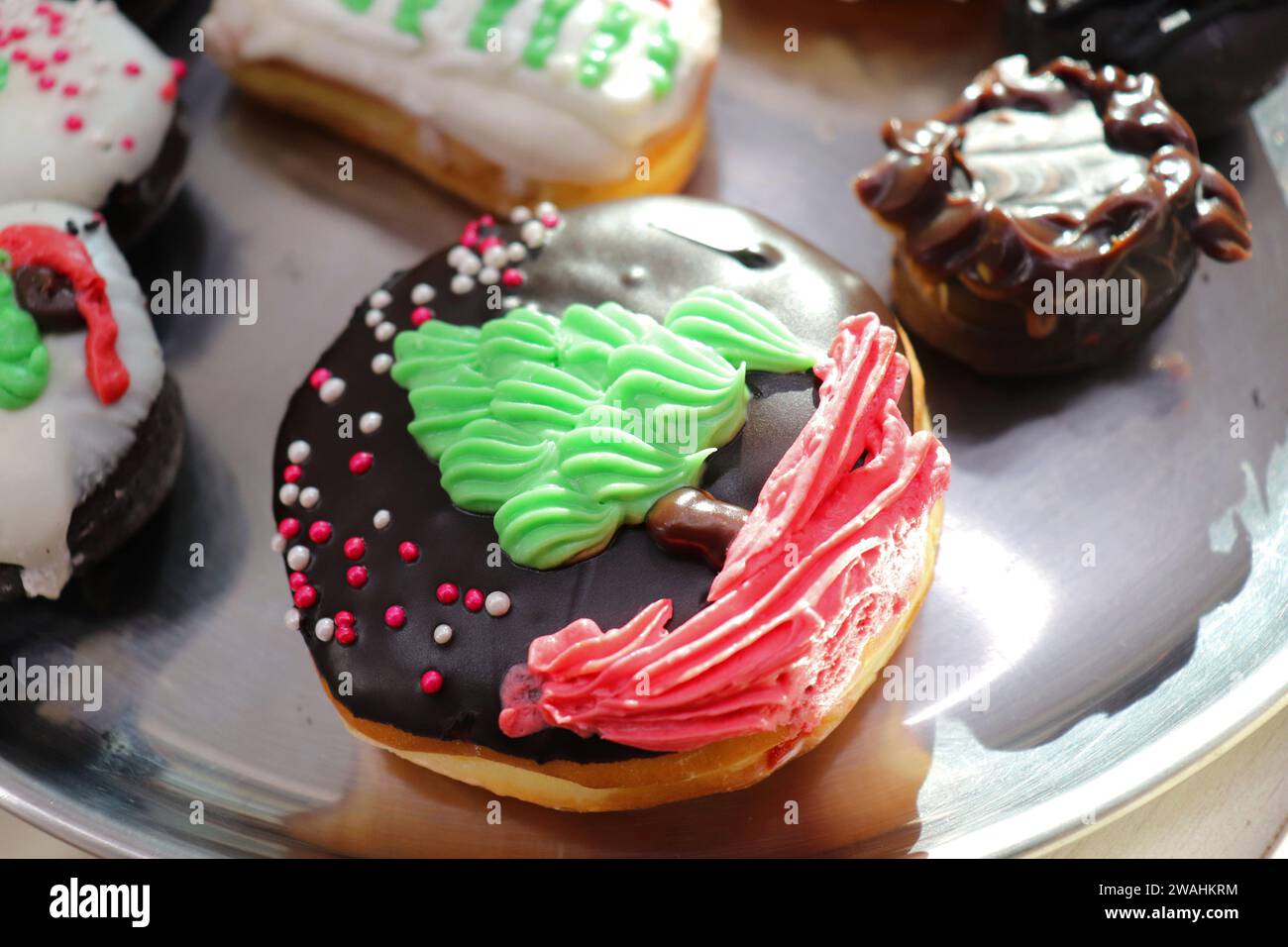 Homemade Glazed Christmas Donuts. Assorted Christmas design donuts ...