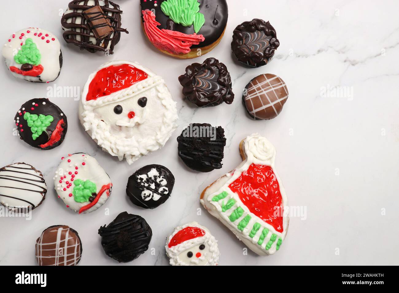 Homemade Glazed Christmas Donuts. Assorted Christmas design donuts ...