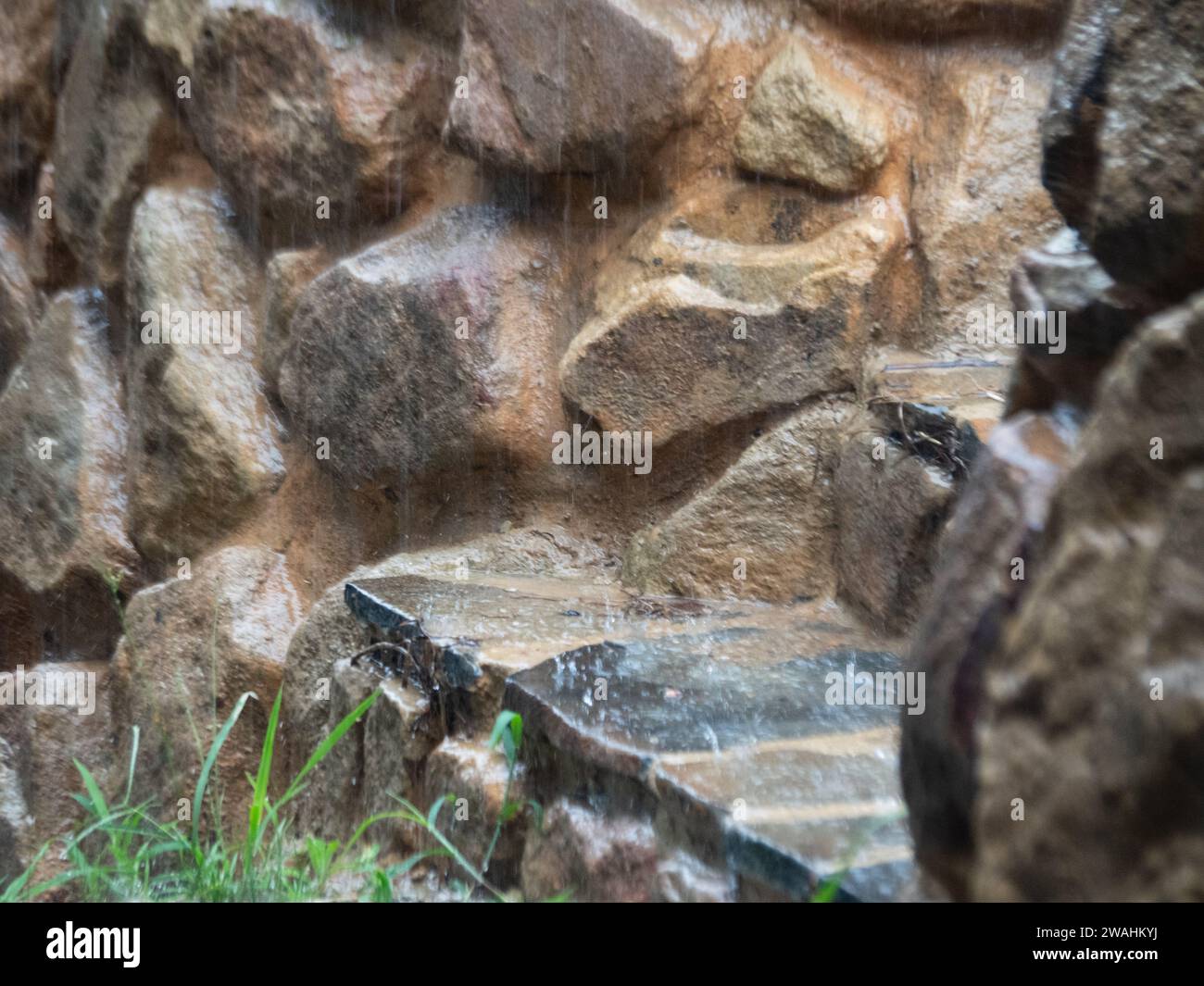 Rain falling on stone steps Stock Photo - Alamy