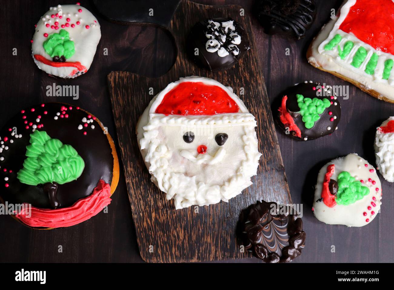 Homemade Glazed Christmas Donuts. Assorted Christmas design donuts ...