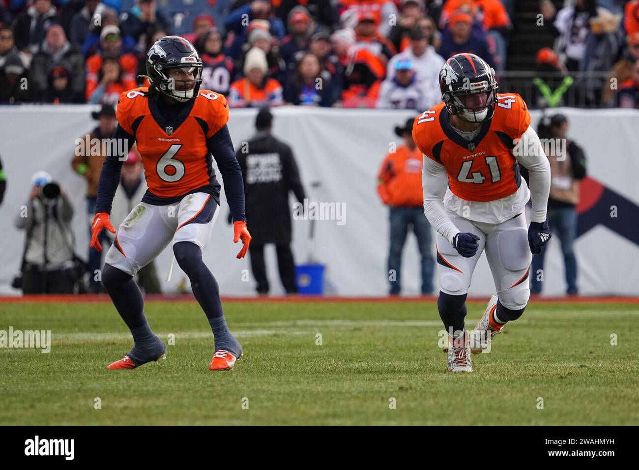 Denver Broncos safety P.J. Locke (6) and Denver Broncos linebacker Drew ...