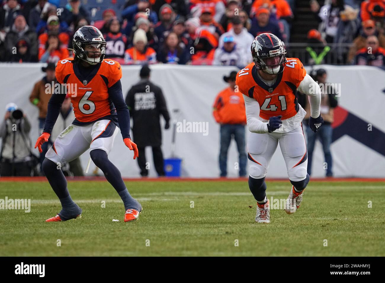 Denver Broncos safety P.J. Locke (6) and Denver Broncos linebacker Drew ...