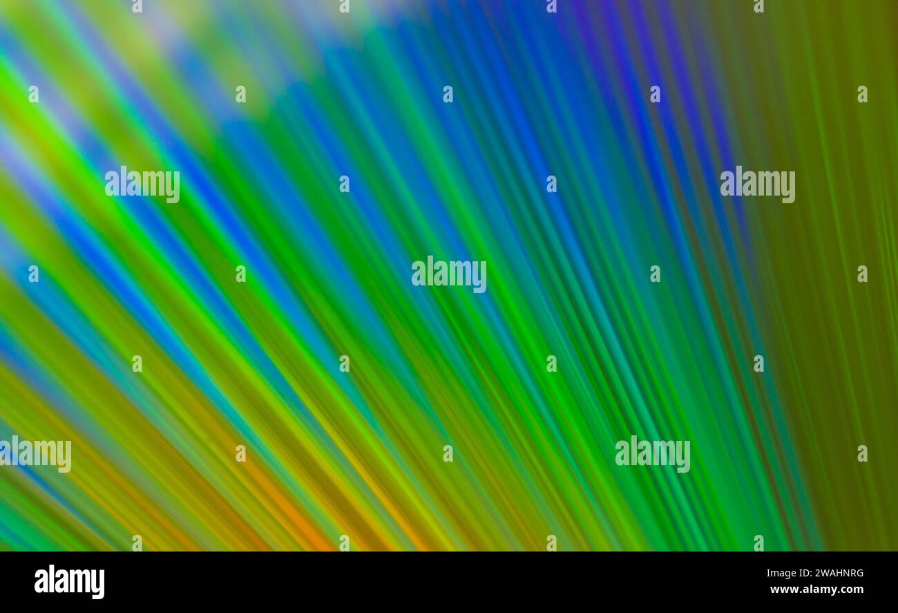 Abstract macro of light rays reflected off compact disk producing ...