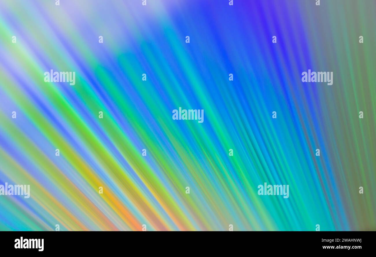 Abstract macro of light rays reflected off compact disk producing ...