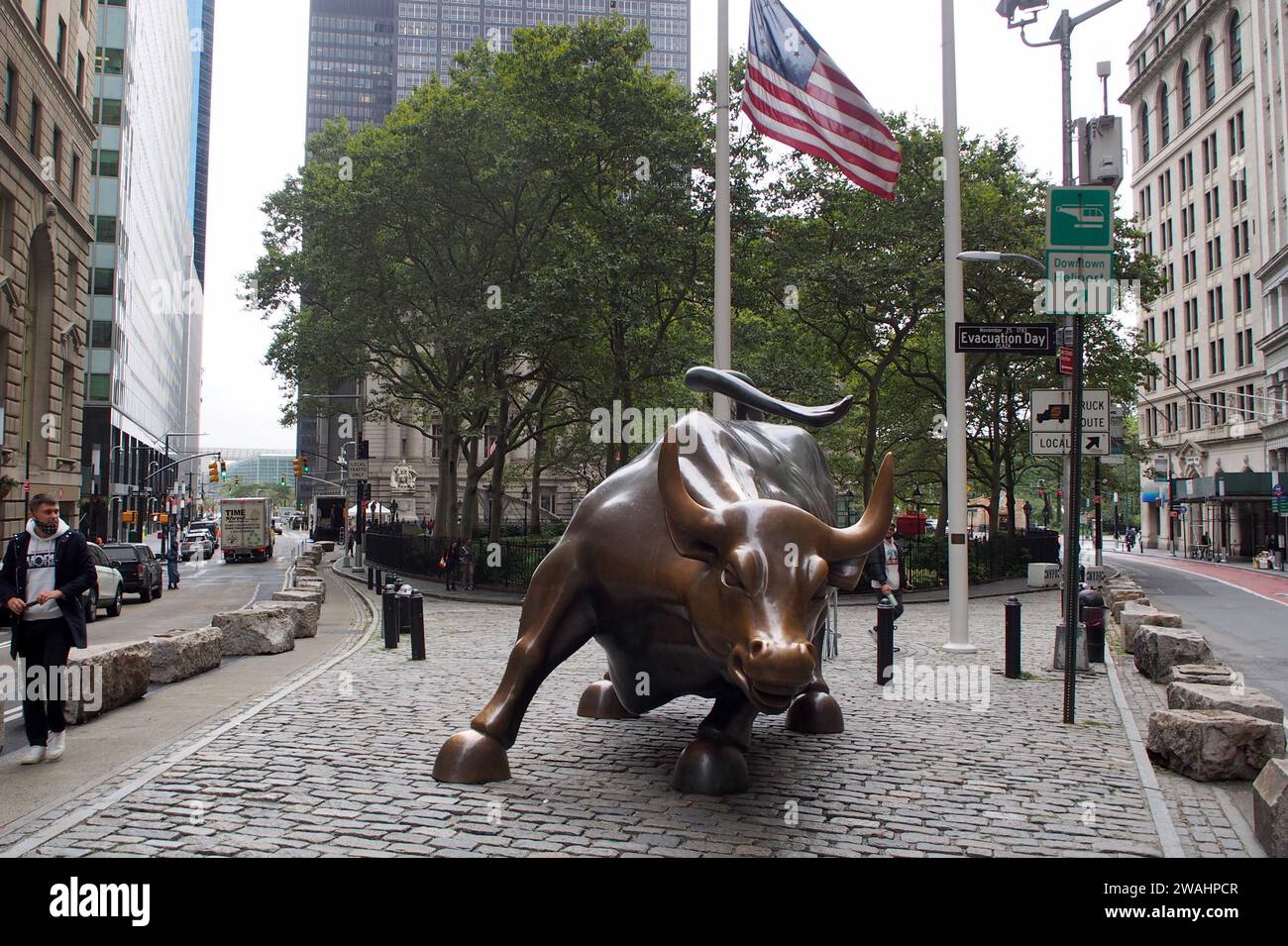 Charging Bull, aka the Wall Street Bull, bronze sculpture by Arturo Di Modica, on Broadway at ...