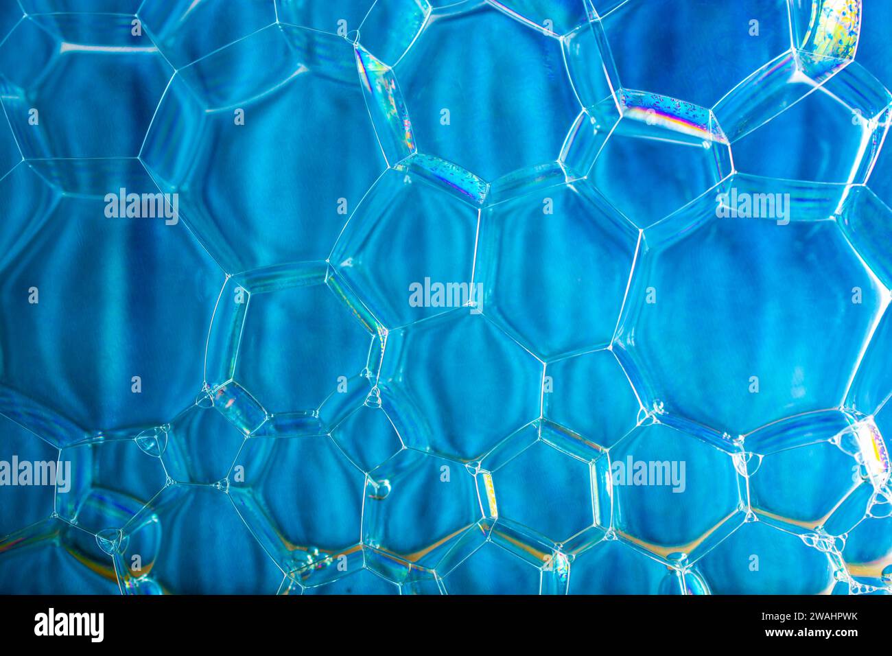 Oil bubbles inside water base form patterns Stock Photo - Alamy