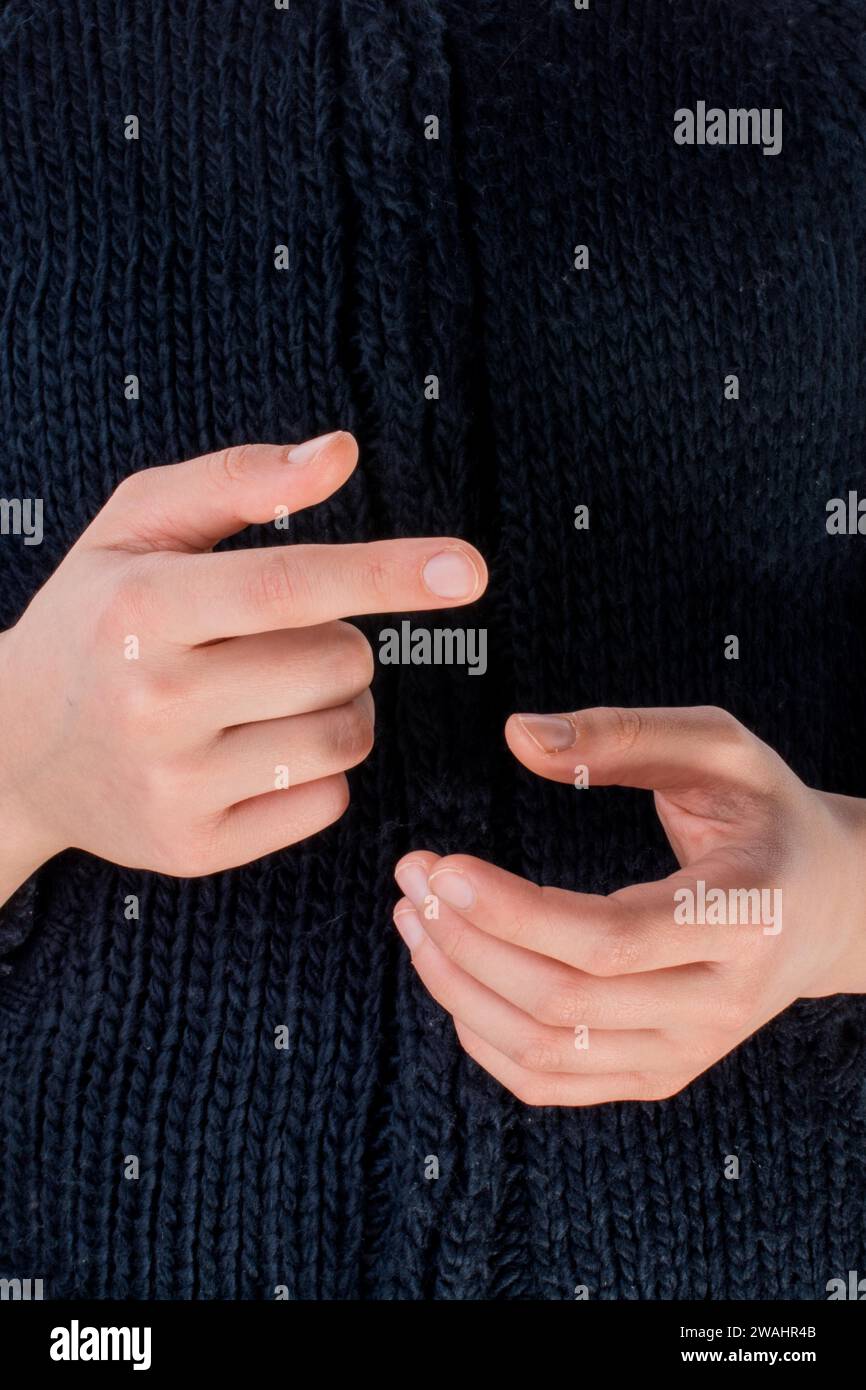 Hand making a gesture on a white background Stock Photo - Alamy