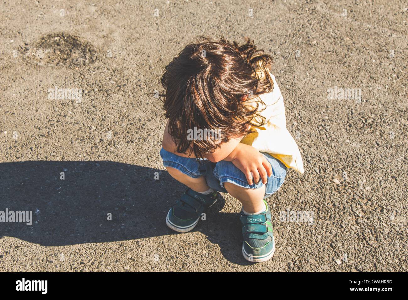 Emotional intelligence and depressed boy looking lonely Stock Photo - Alamy